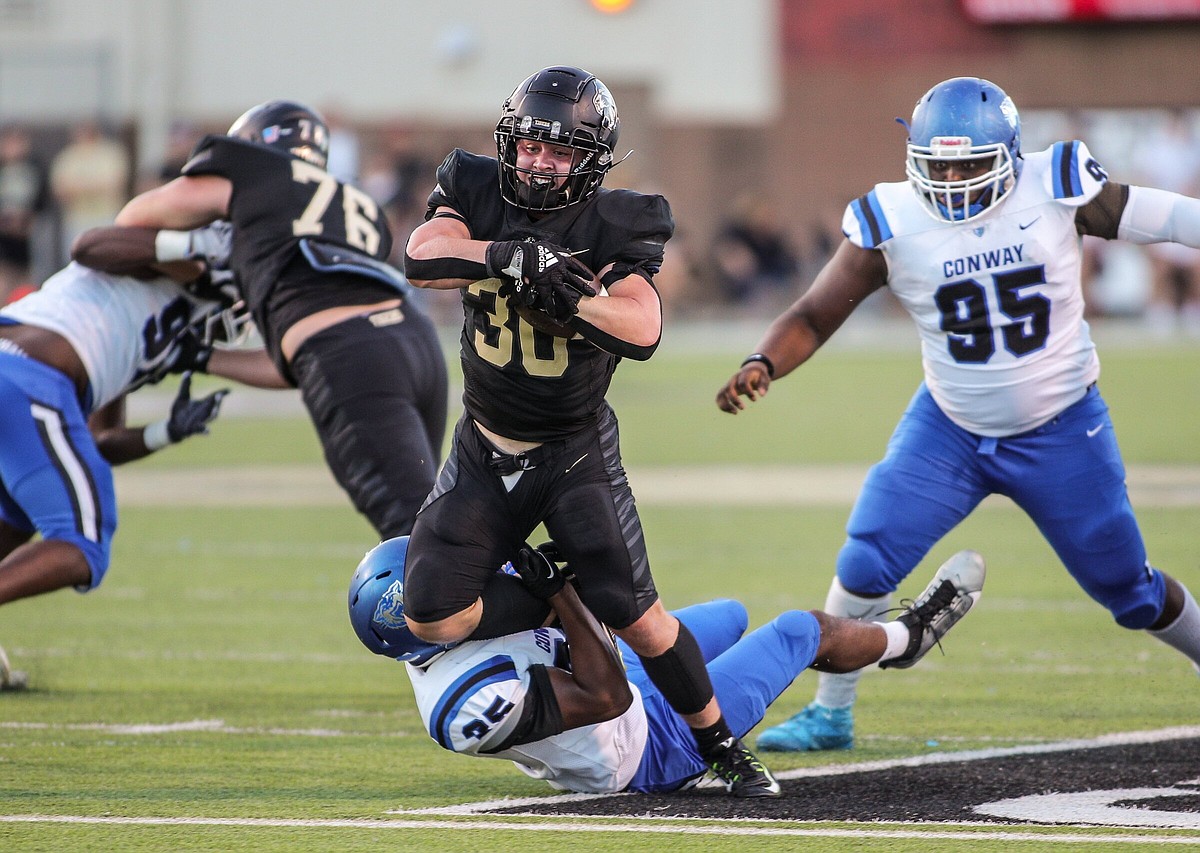 Cats win thriller in James’ debut | Northwest Arkansas Democrat-Gazette