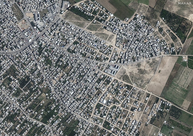 Parts of Gaza look like a wasteland from space. Look for the misshapen ...