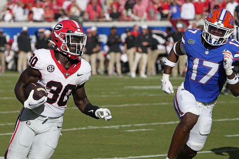 Top-ranked Bulldogs thump outmatched Gators | The Arkansas Democrat ...