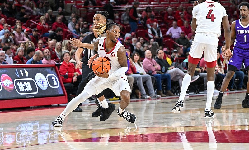 El Ellis makes fast sell to return to lineup | The Arkansas Democrat ...