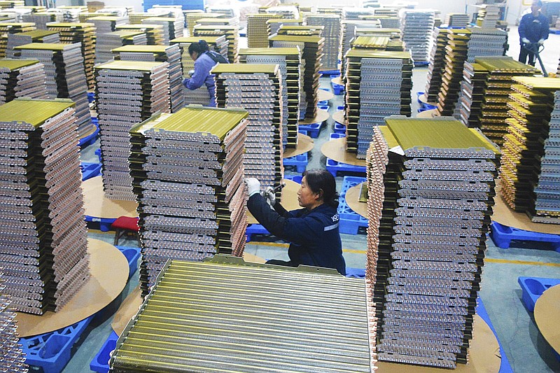 China’s factory activity slows for a 5th month | The Arkansas Democrat ...