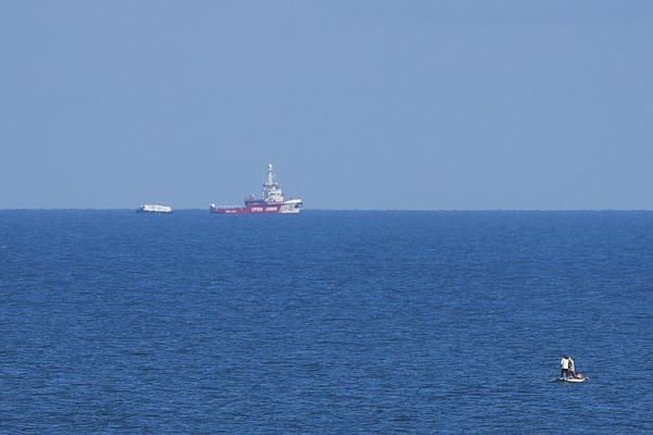 The first ship to use a new sea route delivers aid to Gaza, Israeli ...