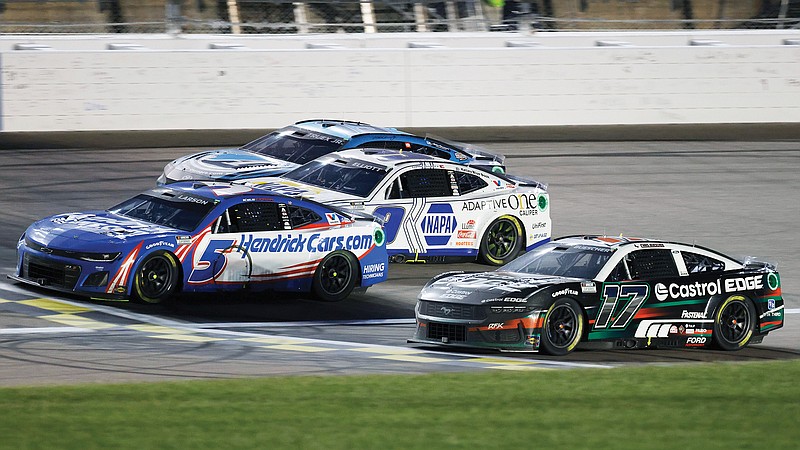 Larson edges Buescher at line at Kansas for closest-ever NASCAR finish ...