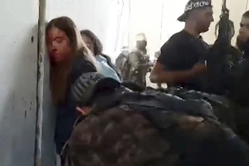 Families of Israeli hostages release video of female soldiers being ...