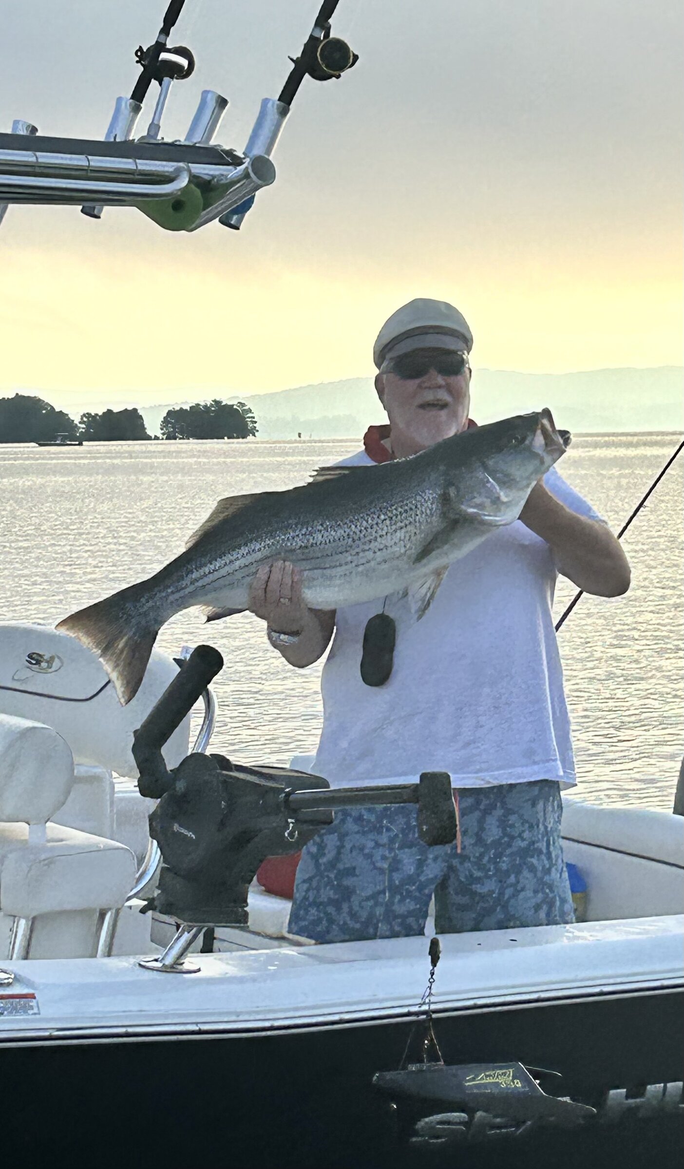 Happy anniversary! Striped bass trio highlights memorable fishing ...