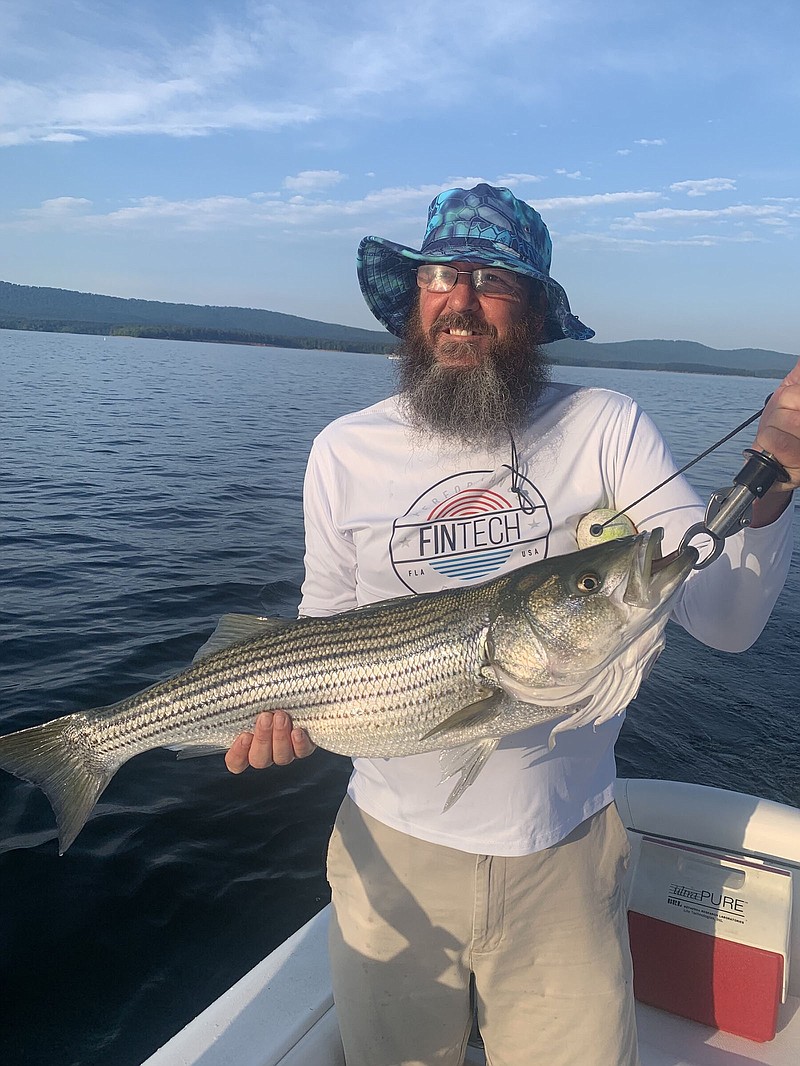 Happy anniversary! Striped bass trio highlights memorable fishing ...