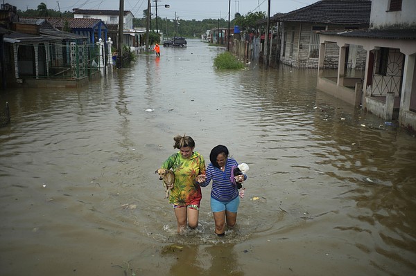 Humans caused climate change. Amid the suffering, now they must solve ...