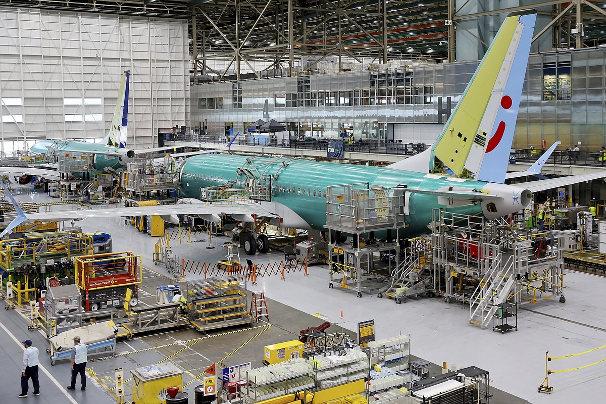 Boeing names new CEO as it posts a loss of more than $1.4 billion in ...