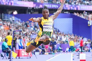 When Hogs fly: Pinnock, McLeod make Olympic long jump final | Northwest ...