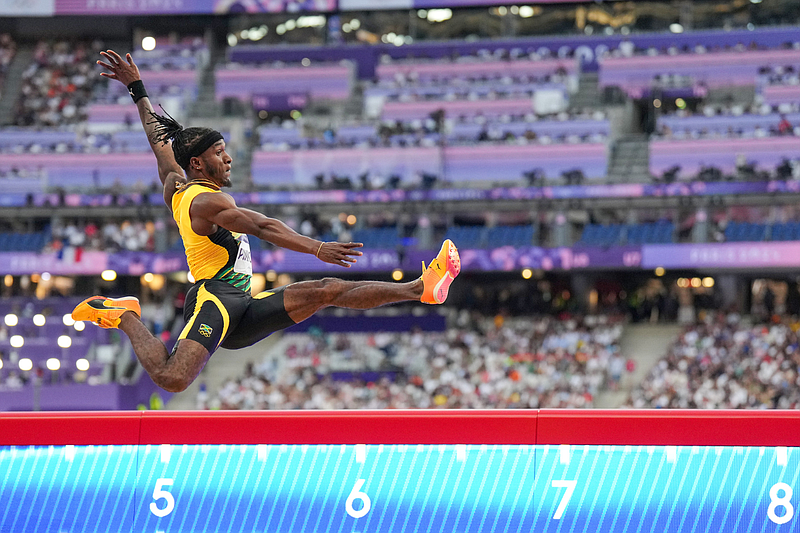 Wayne Pinnock wins silver in long jump, 'Team Arkansas' up to 5 medals at Olympics | Whole Hog ...