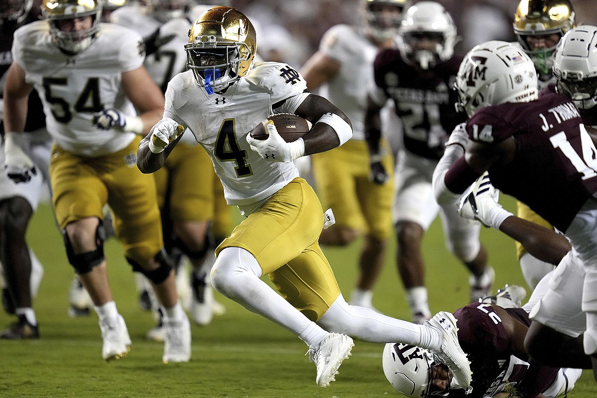 College football roundup: Irish make plays late to beat Aggies ...