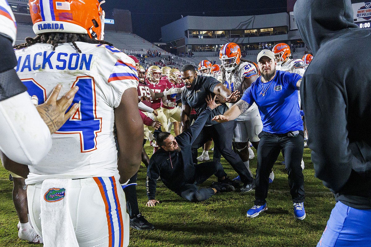 College football players scuffle after flags come out following rivalry ...