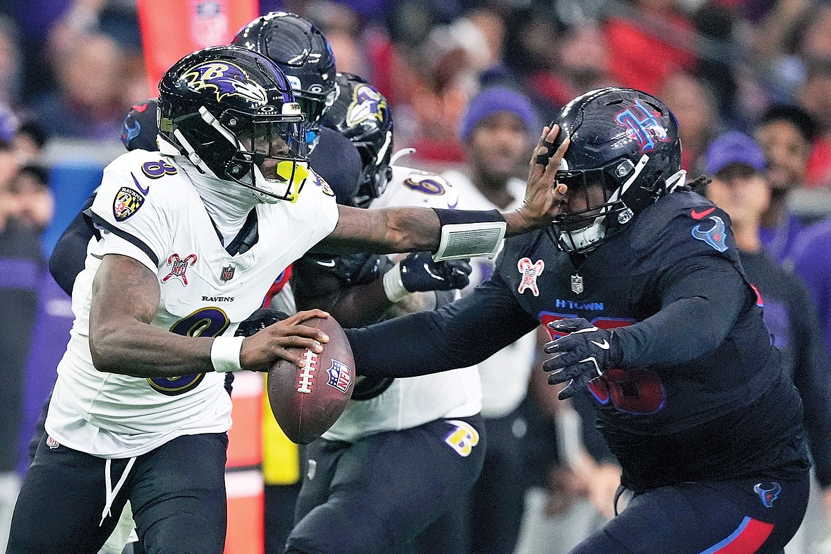 Jackson breaks NFL QB rushing record in Ravens’ romp vs. Texans ...