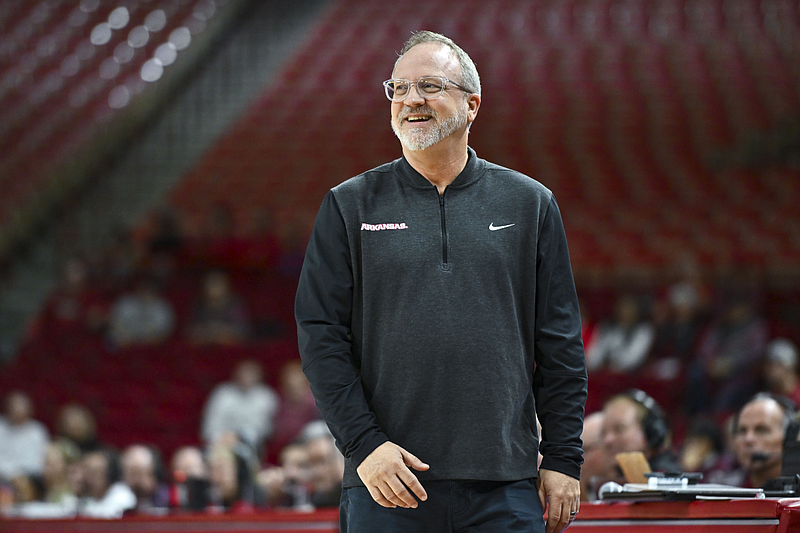 Former Arkansas women's basketball coach Mike Neighbors received ...
