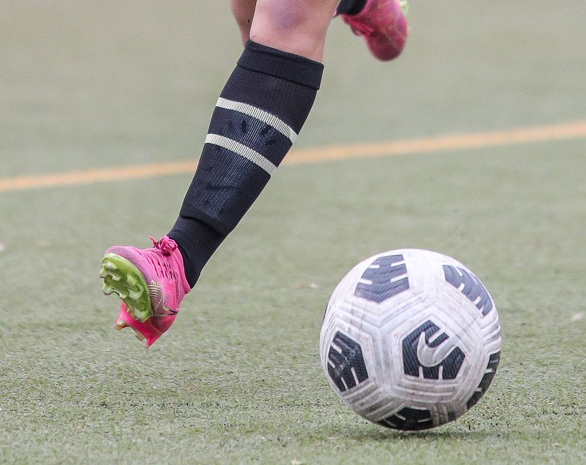 Bentonville Tigers Senior Kayla Hurley (11) dribbles down the pitch ...