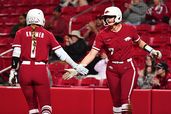 Arkansas softball opens home slate defeating Iowa and Illinois in run ...