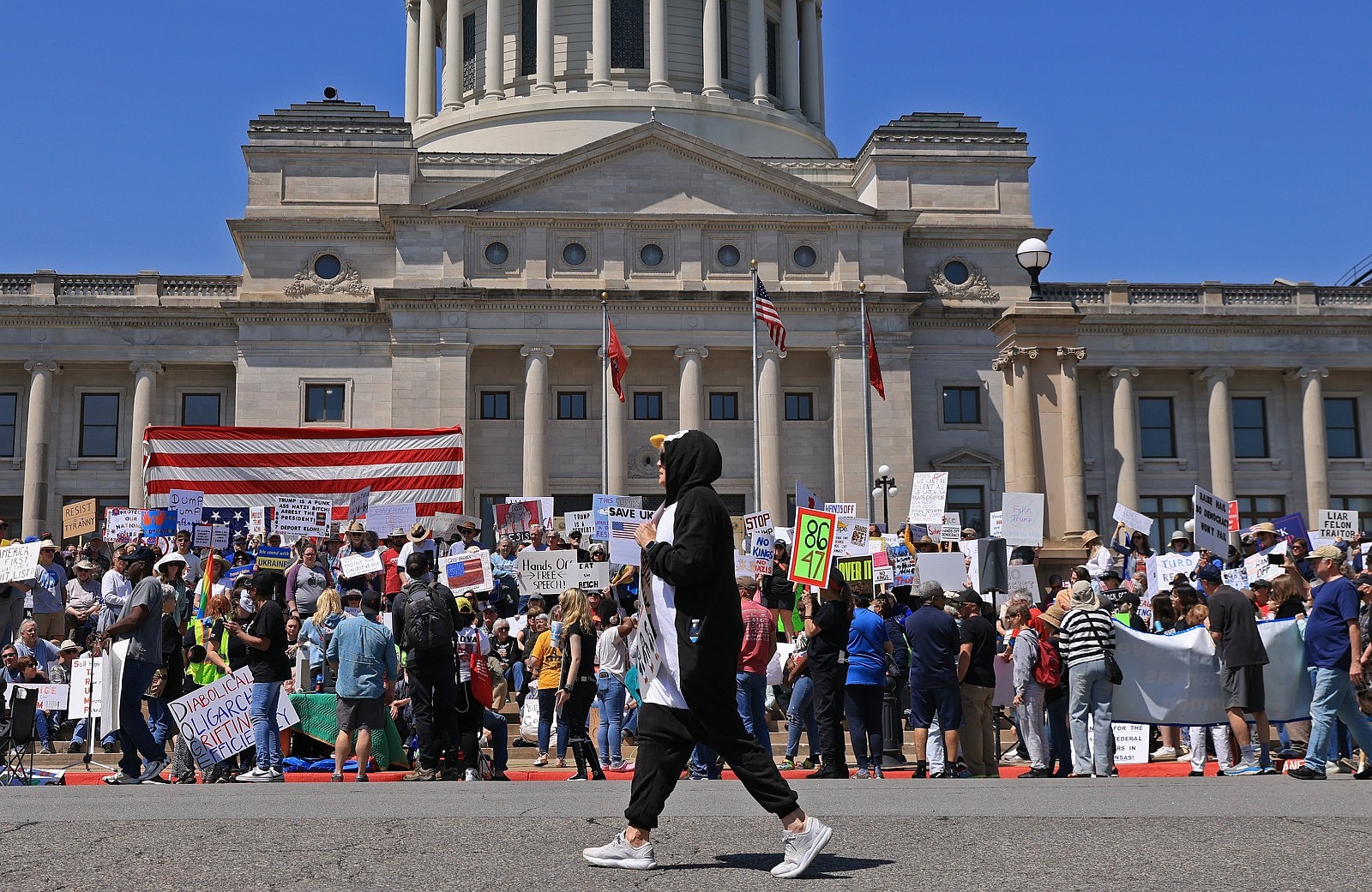 Hundreds of people gather at state Capitol to protest Trump ...