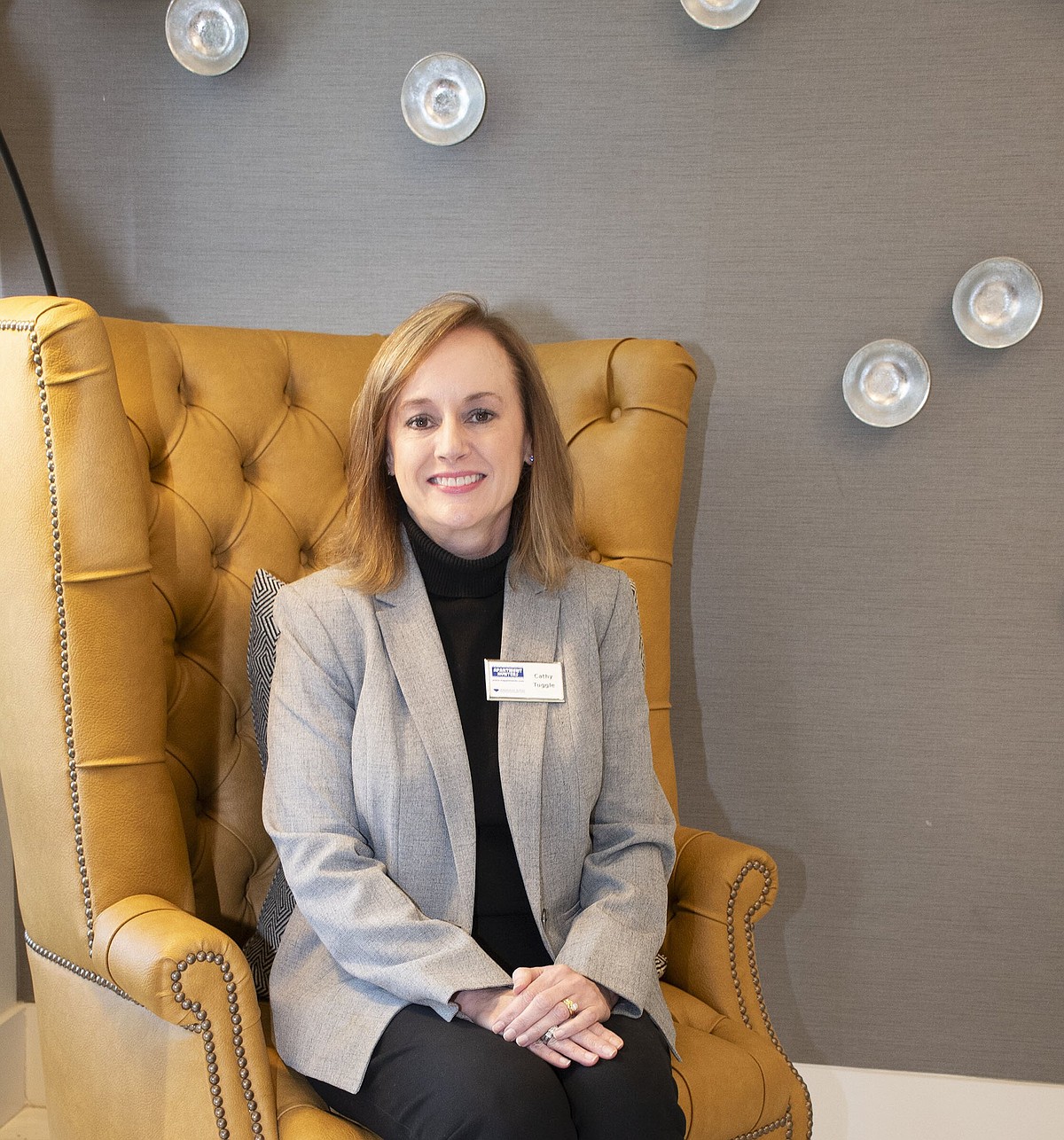 HIGH PROFILE: Cathy Tuggle uses her work as a small business owner to ...