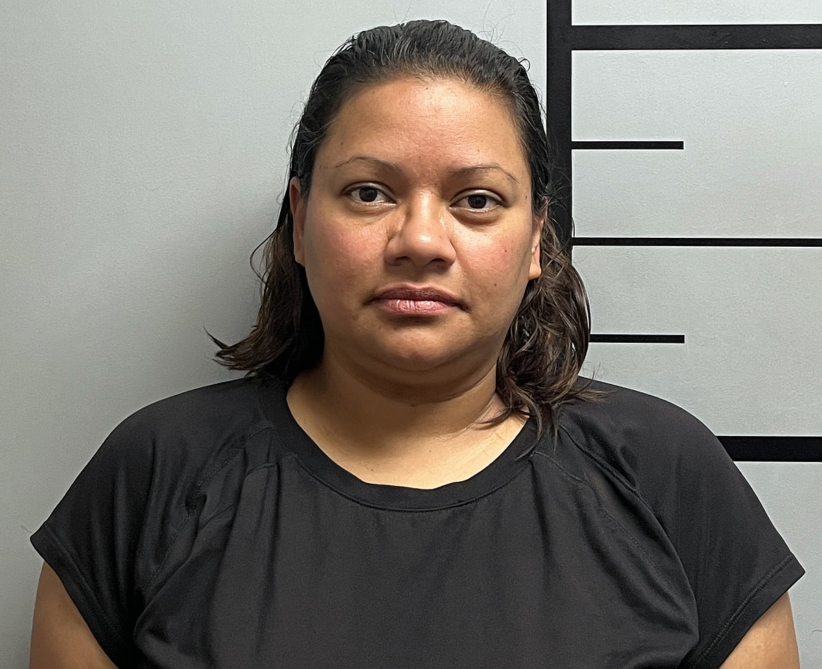 Rogers woman arrested in forgery investigation involving almost half ...