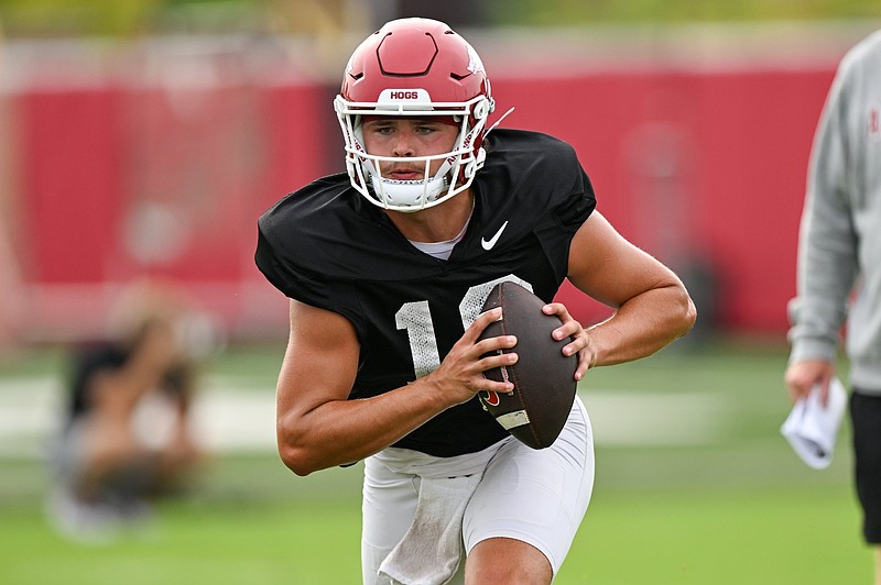 Family and future plans lead former Arkansas pitcher, QB Austin ...
