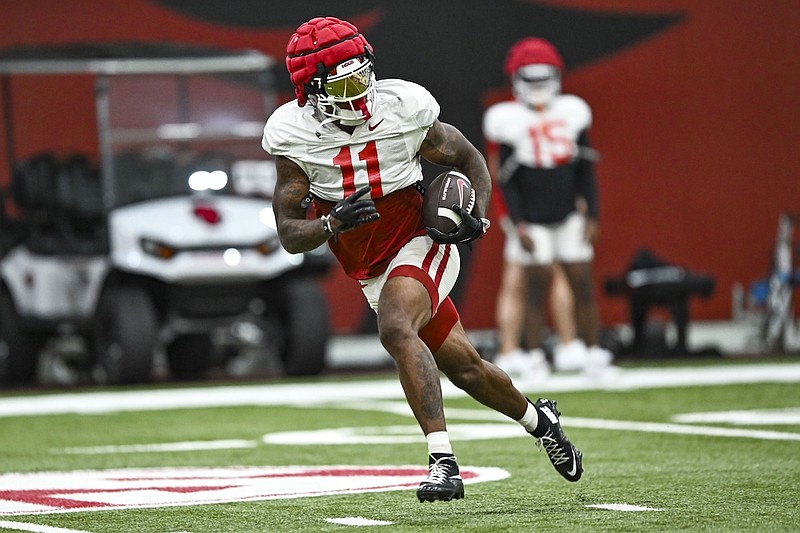 Arkansas football receiver, former MLB player Monte Harrison emerging ...