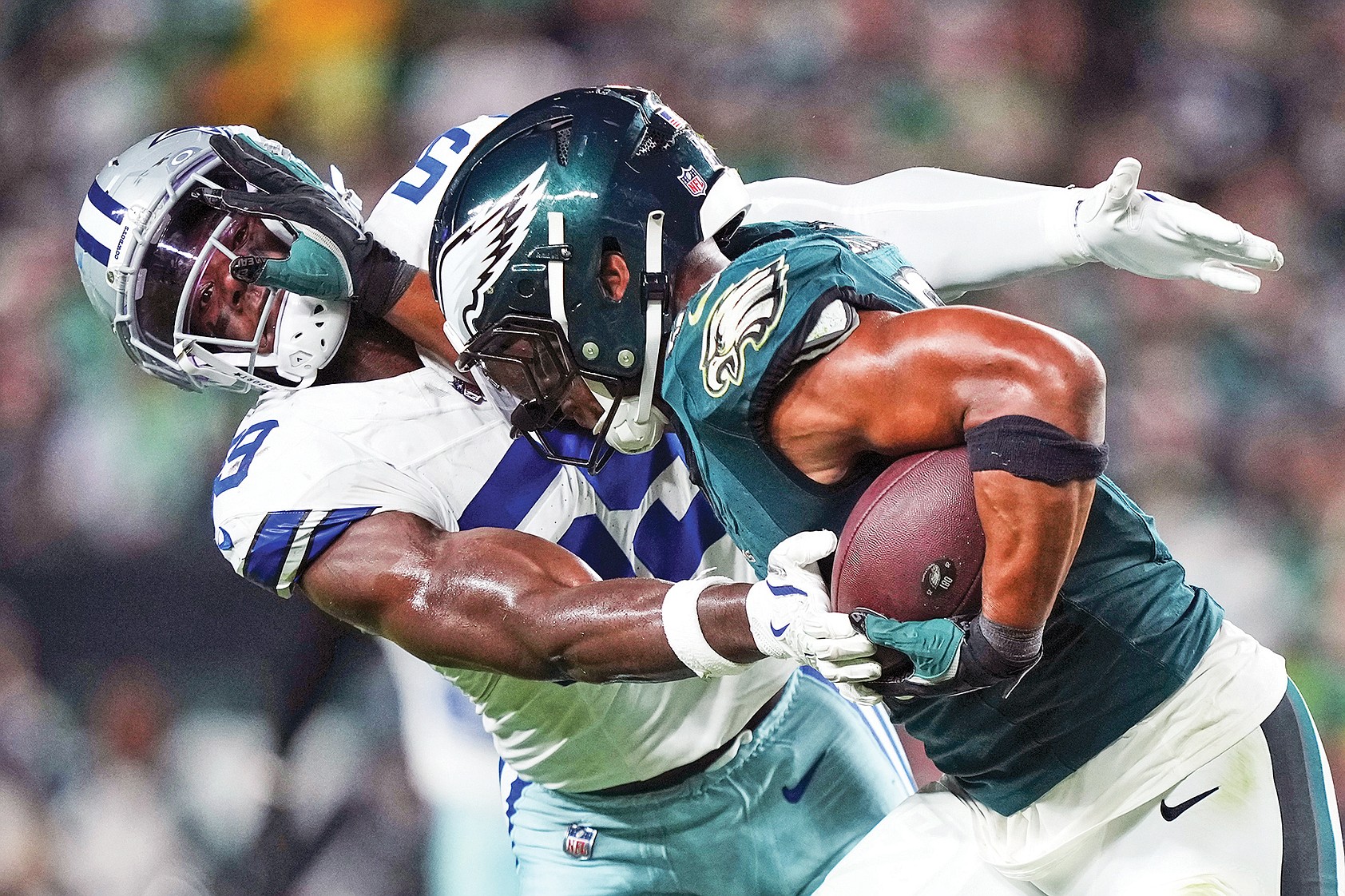 Defending champion Eagles edge Cowboys 24-20 in wild, lightning-delayed ...