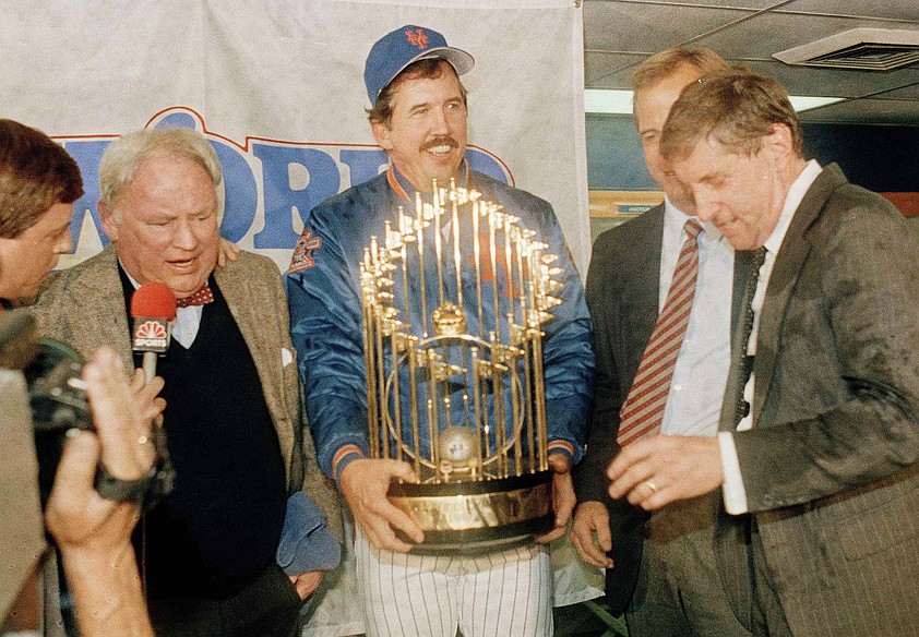 Johnson, who won World Series twice with Baltimore as player, managed ...