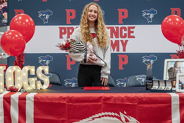 Accomplished Rogers distance runner signs with Arkansas track team ...