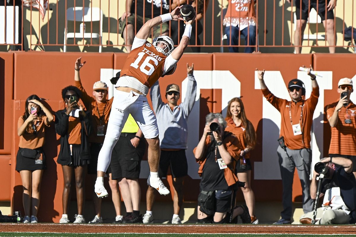Arch Manning scores every which way as Texas hands Arkansas football ...