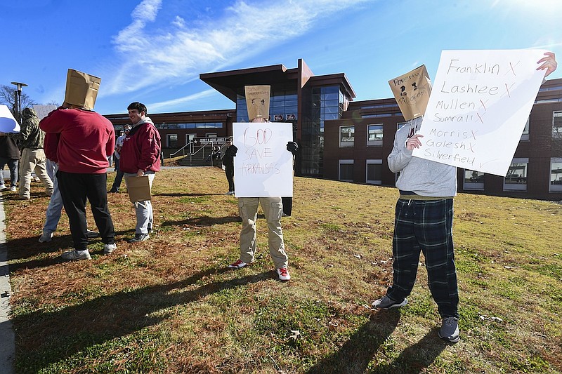 Small group of Arkansas fans gather at Jones Center for short protest ...