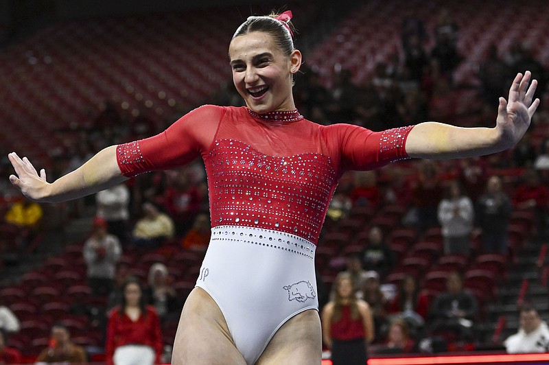 No. 8 Arkansas gymnastics posts second-highest road score but falls at ...