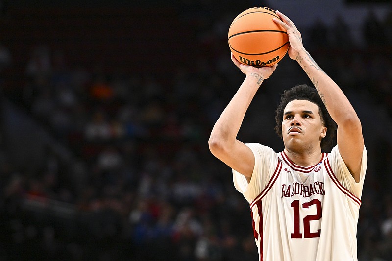 Report: Arkansas basketball forward Malique Ewin enters transfer portal ...