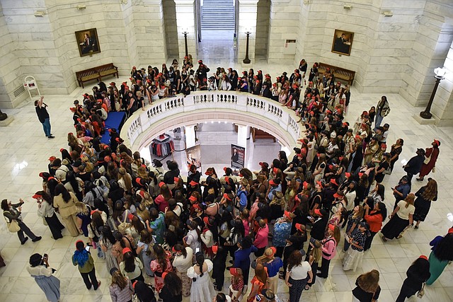 Participants in Arkansas Girls State gather in the rotunda at the state ...