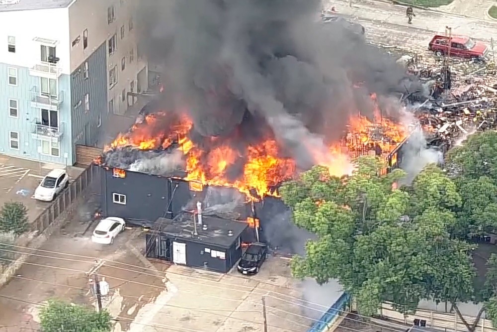 This image made from video provided by KDFW FOX 4 shows a large fire at ...