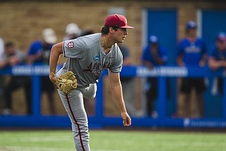 Arkansas pitcher Hunter Dietz throws during a game against Kansas at ...