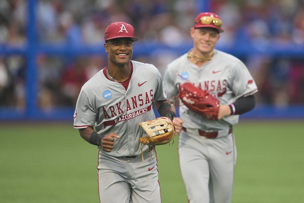 Arkansas outfielders Damian Ruiz (left) and Maika Niu are shown during ...