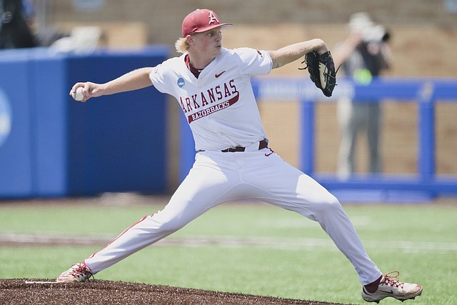 Arkansas pitcher Tate McGuire throws during an NCAA Lawrence Regional ...