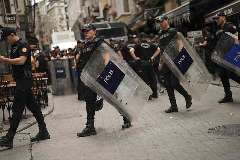 Turkish police detain 3 more employees of satirical magazine over ...