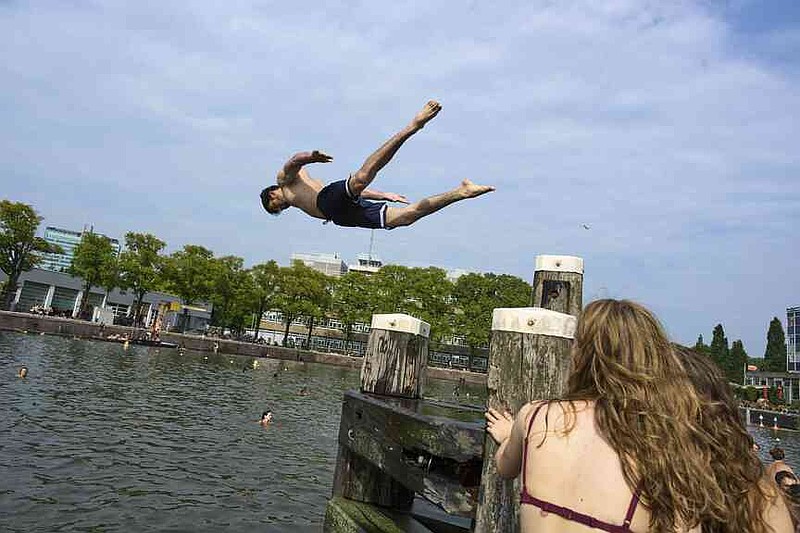 Surrounded by water, Dutch swimmers have plenty of places to cool off ...