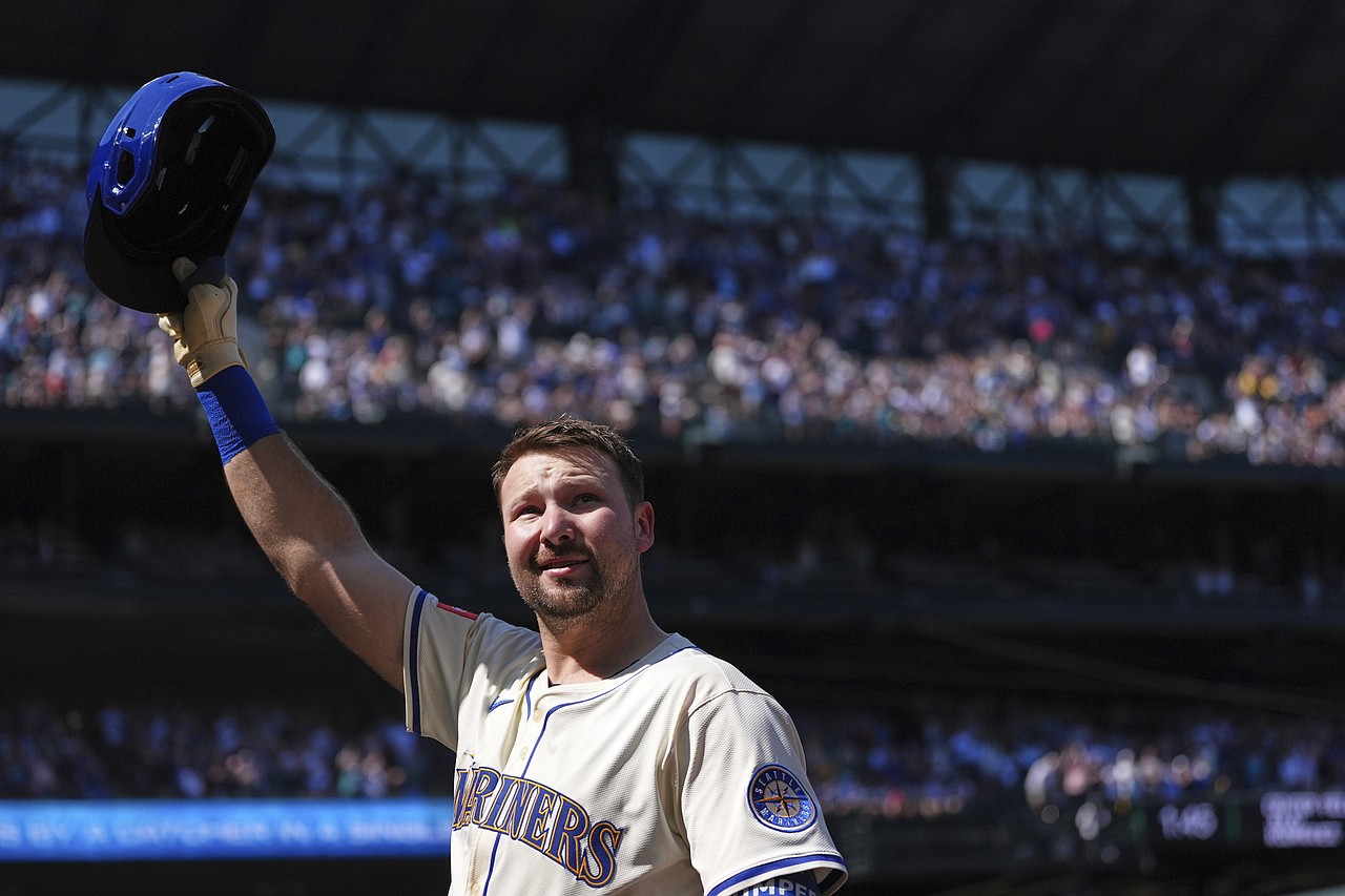 Mariners catcher Cal Raleigh sets an MLB record with 49th homer ...