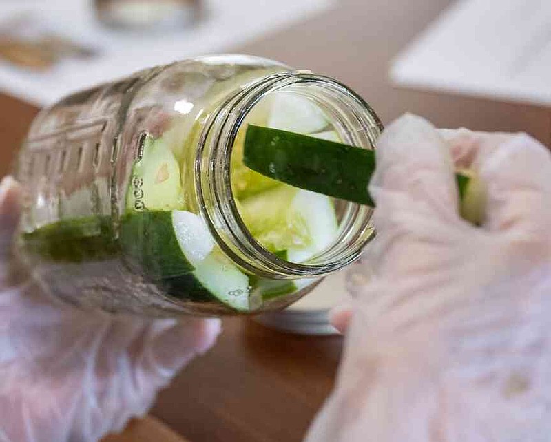 Heisinger Bluffs residents enjoy socializing while making pickles ...
