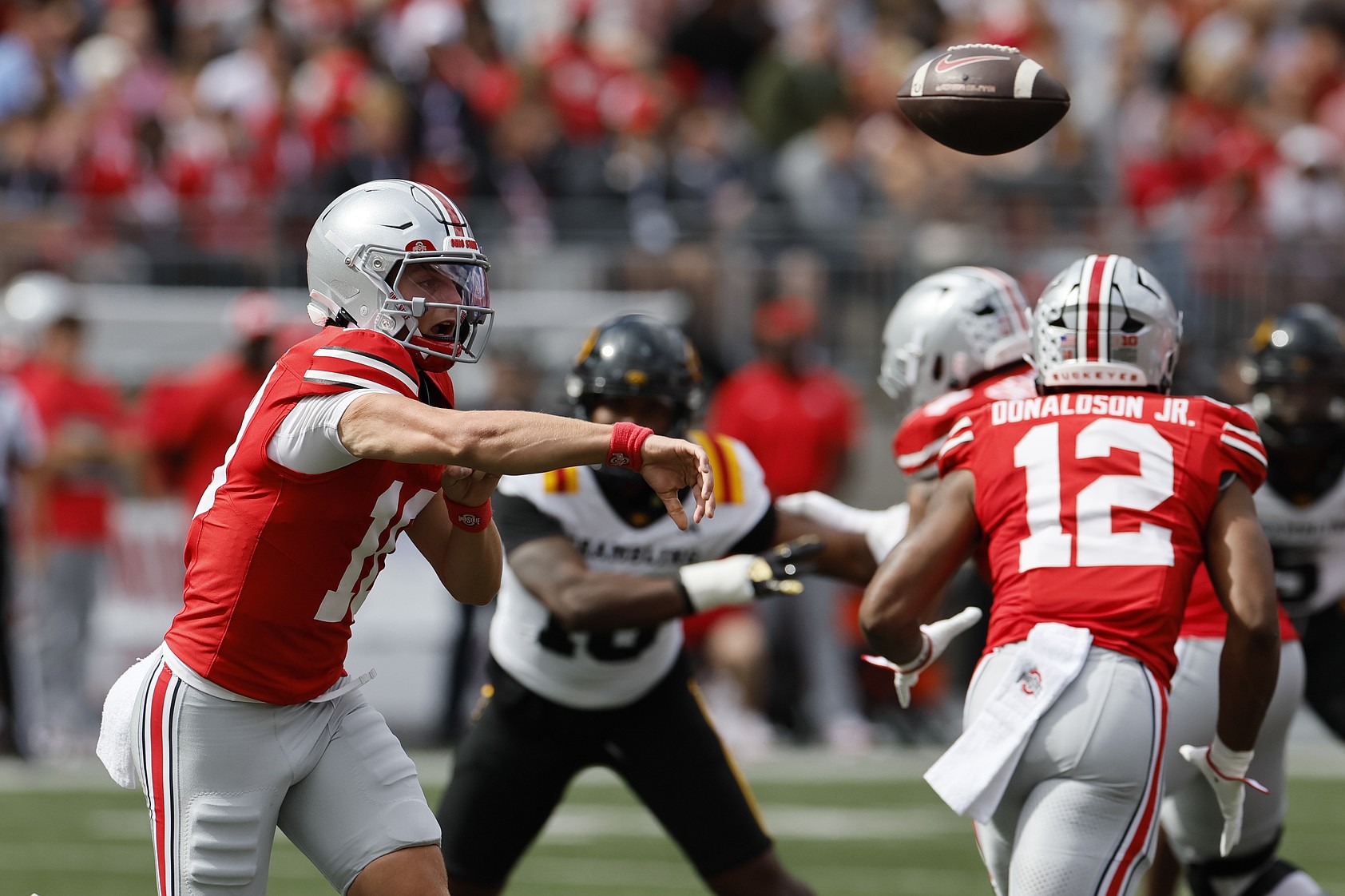 Julian Sayin sets completions mark and No. 1 Ohio State rolls past ...
