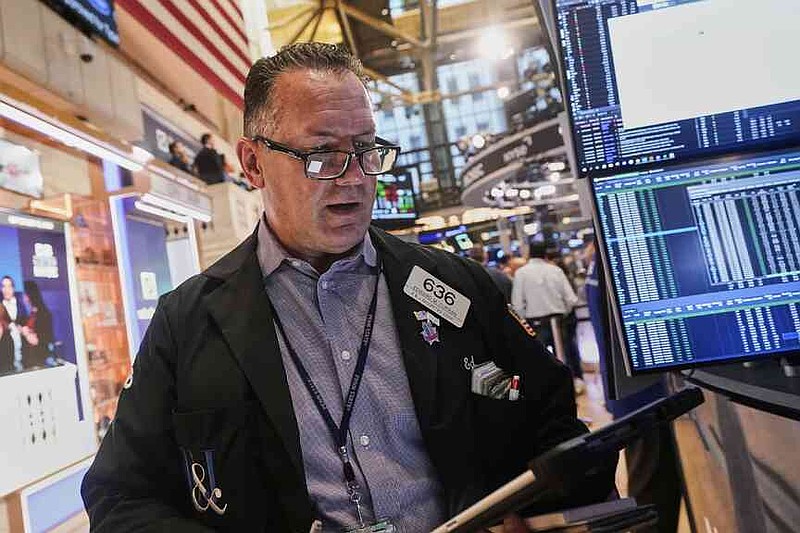 Wall Street ticks to more records Monday as Tesla vrooms higher ...