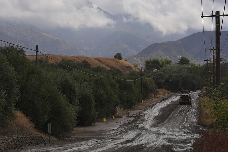 Mudslides trap drivers, bury roads and damage homes in Southern ...