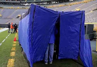 Blue medical tents are a fixture on NFL sidelines | Magnolia Banner News
