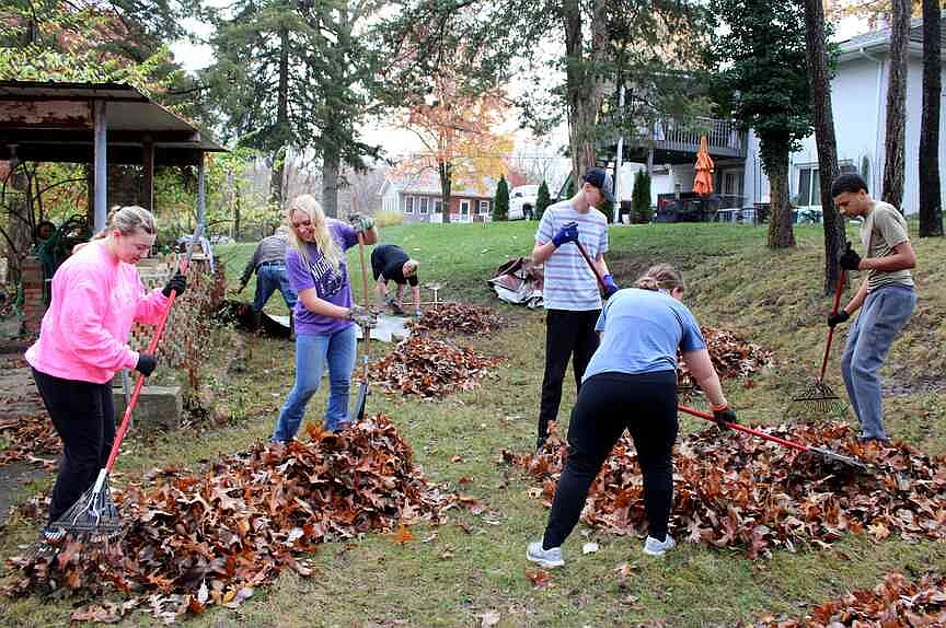 Youths volunteer to rake leaves in support of veterans | Jefferson City ...