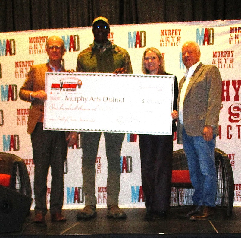 'Mailman' Delivers: Karl Malone Donates $100K to Murphy Arts District ...