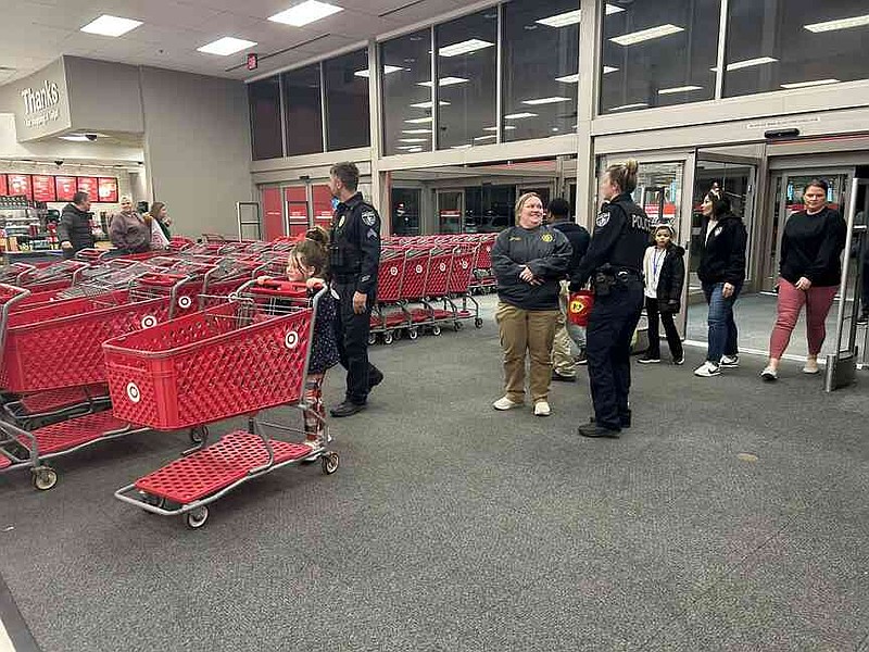 Shopping carts filled to the brim during Shop With A Cop night ...