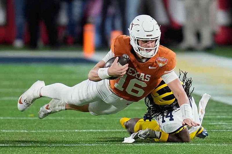 Manning leads Texas to win over Michigan | Texarkana Gazette