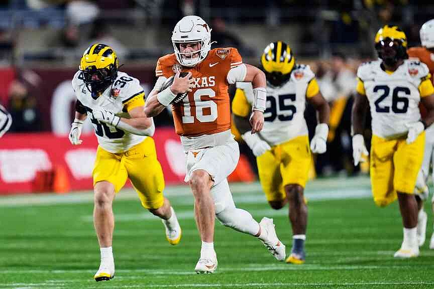 Manning leads Texas to win over Michigan | Texarkana Gazette